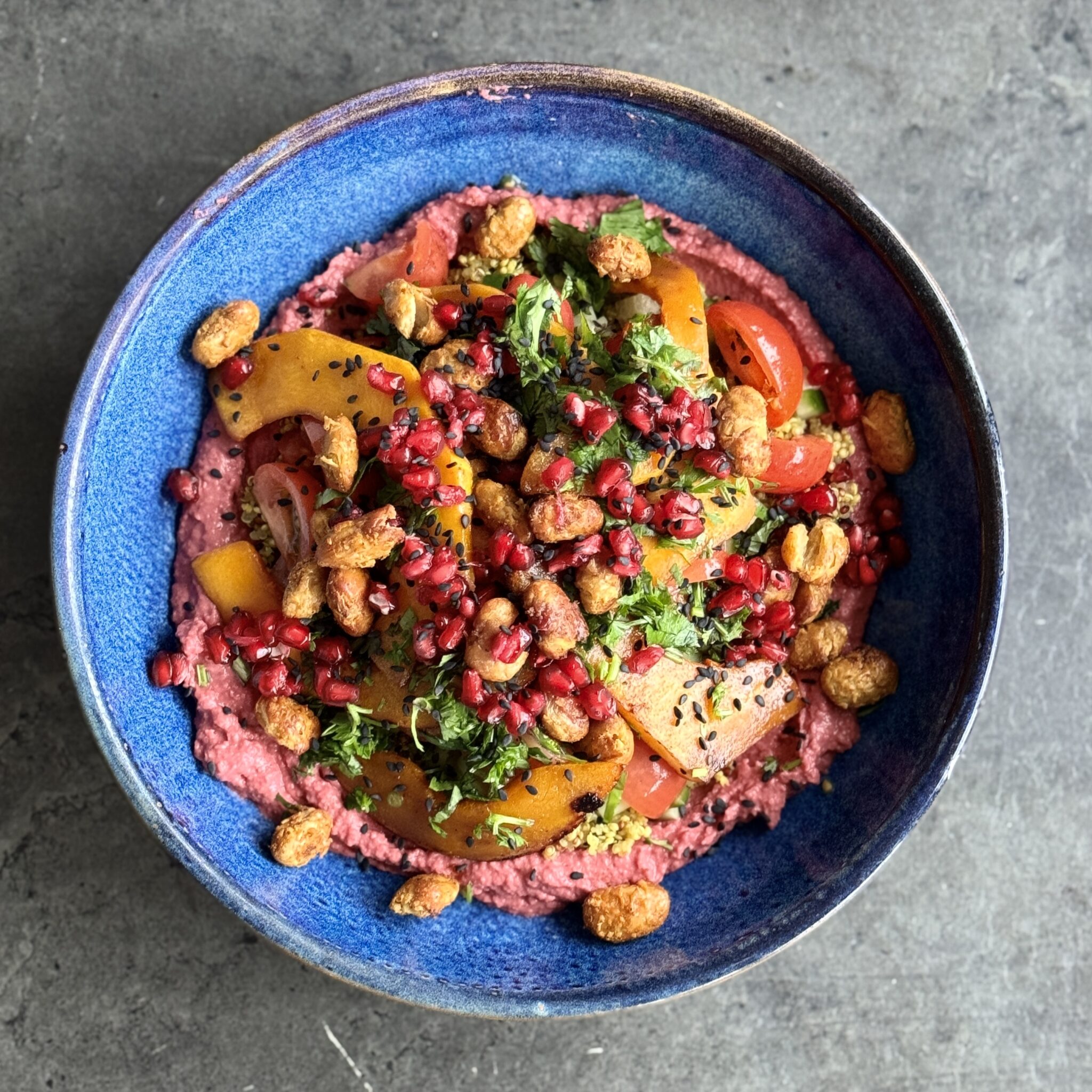 Roasted Squash Nourish Bowl on Beet Hummus - The Happy Pear